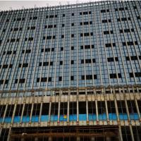 China Steel Structure Prefabricated Commercial Office Building Q345B Multi-High-Rise Box-Shaped for sale