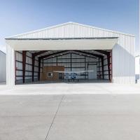 China Modern Light Steel Aircraft Hangar - 60m Clear Span, 200 km/h Wind Resistance, 50-Year Design Life for sale