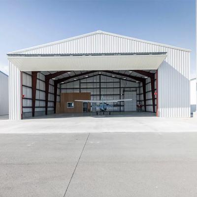 China Modern Light Steel Aircraft Hangar - 60m Clear Span, 200 km/h Wind Resistance, 50-Year Design Life for sale