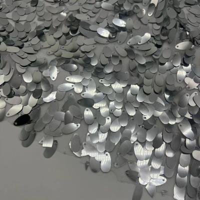 China Classic Sequins Embroidery Fabric White Color 100% Polyester Fabric For Decorate Clothes for sale