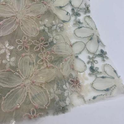 China Sequins Embroidery Fabric 100% Polyester Soft And Comfortable For Sequin Dresses for sale