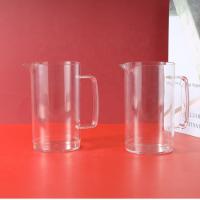 China Heat Resistant Plastic Beverage Pitcher 29oz Plastic Juice Jug With Handle for sale