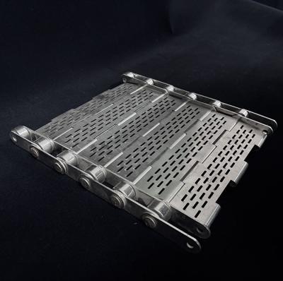 China Chain Plate Punch With Side Baffle Stainless Steel Conveyor Belt For Sort for sale