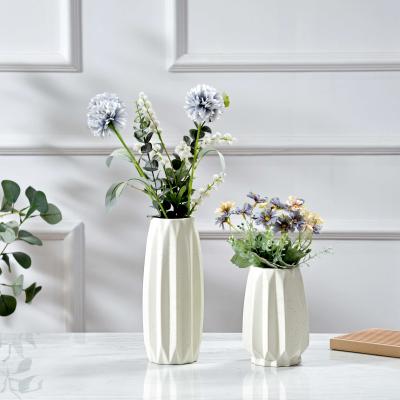 China Smooth Small Ceramic Vase For Modern Table Racks Living Rooms Bathroom for sale