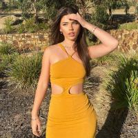 China Halter Hollow Women's Summer Vacation Dresses Sleeveless Mid Length for sale