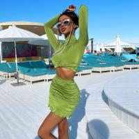 China Green Two Piece Casual Set Round Neck Long Sleeve Hollow T Shirt Slim Fit Hip Skirt for sale