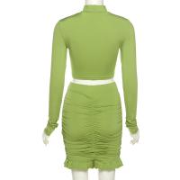 China Green Two Piece Casual Set Round Neck Long Sleeve Hollow T Shirt Slim Fit Hip Skirt for sale