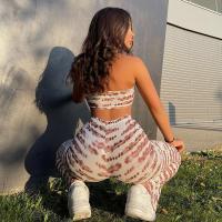 China Breathable 2 Piece Crop Top And Trousers Halter Hollow Vest Slim Micro Trousers Set for sale