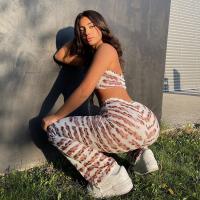 China Breathable 2 Piece Crop Top And Trousers Halter Hollow Vest Slim Micro Trousers Set for sale