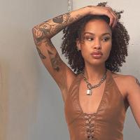China Hollow Sexy Short Slim Umbilical Lace Up Front Tank Top for sale