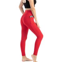 China Elastic Fitness Gym Seamless Butt Lifting Leggings With Pocket for sale
