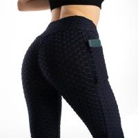China Elastic Fitness Gym Seamless Butt Lifting Leggings With Pocket for sale