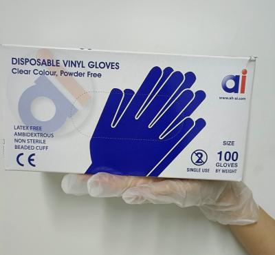 China Smooth Powdered Vinyl Disposable Gloves Used In Food Processing for sale