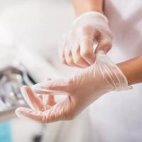 China Powder Free Vinyl Disposable Gloves 9.5 Inch Clear Medical Exam Gloves S M L XL for sale