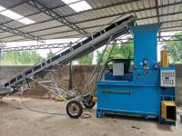 China Wood Shaving Bagging Machine with Air Cooling 22KW Hydraulic Baler for Animal Bedding Litter for sale