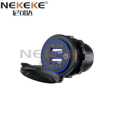 China Dual USB Marine Power Socket 4.2A 12-24V Waterproof Boat Outlet with Blue LED Indicator 5.4x3.7cm for sale