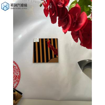 China Vibrant Orange Tinted Mirror Glass Sheet for Amusement Wall Decor in Rectangle Shape for sale