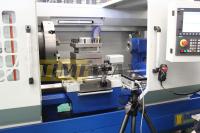 China QK-255F Series CNC Oil Country Lathe Pipe Thread Machining Center with 420mm X Axis Travel for sale