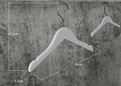 China Glossy White Painting Wooden Clothing Store Hangers With 360 Degree Swivel for sale