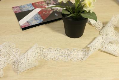 China Curved Edging Guipure Lace Trims , Interlining 2 Inch Lace Trim Perforated for sale