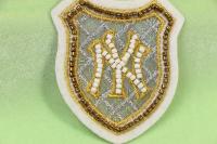 China Stylish Silver Gold Metallic Embroidery Badge With White Felt Ground Beads Around For Caps Shoes for sale