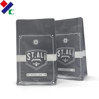 China 250g Front Zipper Black Kraft Paper Coffee Bean Packaging Bag for sale