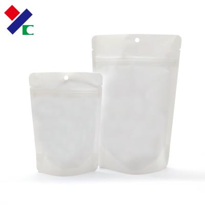China Compostable Biodegradable Packaging Bags White Kraft Stand Up Pouch With Zipper for sale