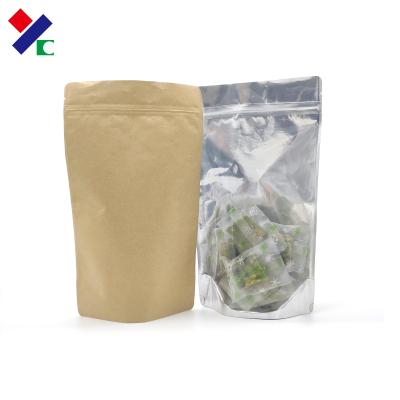 China ASTM Kraft Paper Front Clear Stand Up Zipper Pouch Tear Notch Food Grade for sale