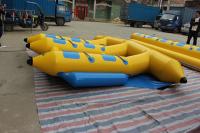 China Summer Watertoys 6 Seaters Inflatable Flying Fish Towable Red Orange Yellow for sale