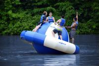 China Giant Durable PVC Inflatable Water Park Disco Boat Inflatable Saturn for sale