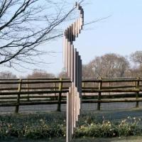 China Outdoor Garden Stainless Steel Pipe Abstract Rotate Metal Sculptures for sale