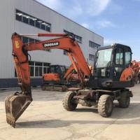 China 6 Tons Used Wheel Excavator Fuel Saving Doosan Korean Excavator DX60W for sale