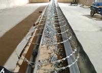China Hot Dipped Galvanized BTO-18 Concertina Coil Wire Flat Wrap Razor Barbed Wire for sale