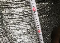 China Galvanized Double Twist Barbed Wire 20kg/Coil For Grass Boundary for sale