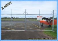 China Rust Resistant Tall Chain Link Fence Fabric ASTM Steel Barbed Wire For Airport for sale