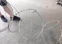 China Hot Dipped Galvanized High Security Cbt-65 Razor Barbed Wire Concertina Wire For Wire Fencing for sale