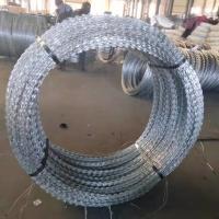 China Bto16 Security Concertina Spiral Razor Barbed Wire Mesh Cross Razor Fence Materials for sale