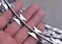 China BTO-16 Concertina Razor Barbed Wire 1100mm 7 Clips 35kg /Roll 20-25m for sale