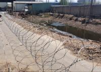 China Hot Dipped Galvanized Barbed Razor Blade Concertina Wire For Anti-Piracy for sale