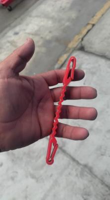 China Red Plastic Support Clips That Go Between The Concertina Wire And The Wire for sale