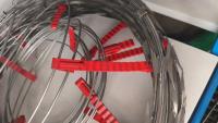 China Red Plastic Support Clips That Go Between The Concertina Wire And The Wire for sale