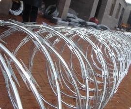 China Galvanized Security Concertina Price Anti Climb Blade Barbed Wire Prison Razor Barbed Wire for sale
