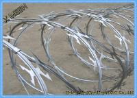 China Hot Dipped Galvanized Concertina Razor Barbed Wire - 2.5mm Wire Diameter, 450-980mm Coil Sizes for sale