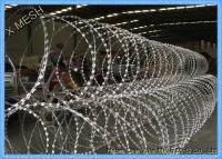 China BTO-22 450mm Diameter Galvanized Concertina Razor Barbed Wire with 0.5mm Thickness and 2.5mm Wire Diameter for sale