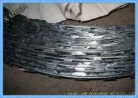 China Heavy Zinc Coating Concertina Razor Blade Barbed Wire with 33-144 Loops and BTO/CBT Blade Types for sale