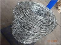 China Industrial Barbed Wire Fencing - 2 Strand 4 Point Configuration with 3-6 Inch Barb Spacing for Security and Livestock Protection for sale