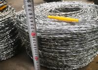 China 9 Gauge Military Barbed Wire - PVC Coated Security Fencing in 10kg, 15kg, 17kg, 20kg Rolls with 3-6 Inch Spacing for sale