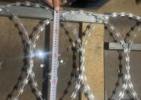China 500mm Coil Diameter Flat Rape Coils Razor Wire To Security Fence for sale