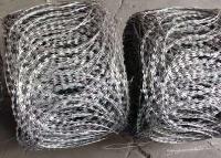China Hot Galvanized BTO22 Razor Wire Flat Wrap - 22mm Barb Length, 450-980mm Diameter for Farm Security Fencing for sale