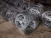 China Hot Dipped Galvanized BTO-18 Concertina Coil Wire Flat Wrap Razor Barbed Wire for sale